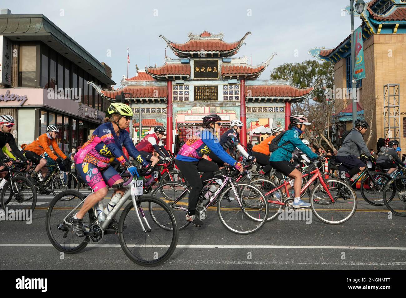 Cyclists star on a 20 mile bike ride at the L.A. Chinatown Firecracker ...