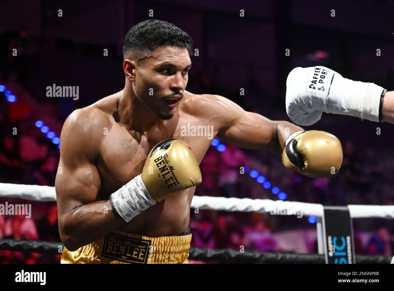 Stuttgart, Germany. 18th Feb, 2023. Boxing: Anas El Abid (r) from Germany against Huliakevich ...