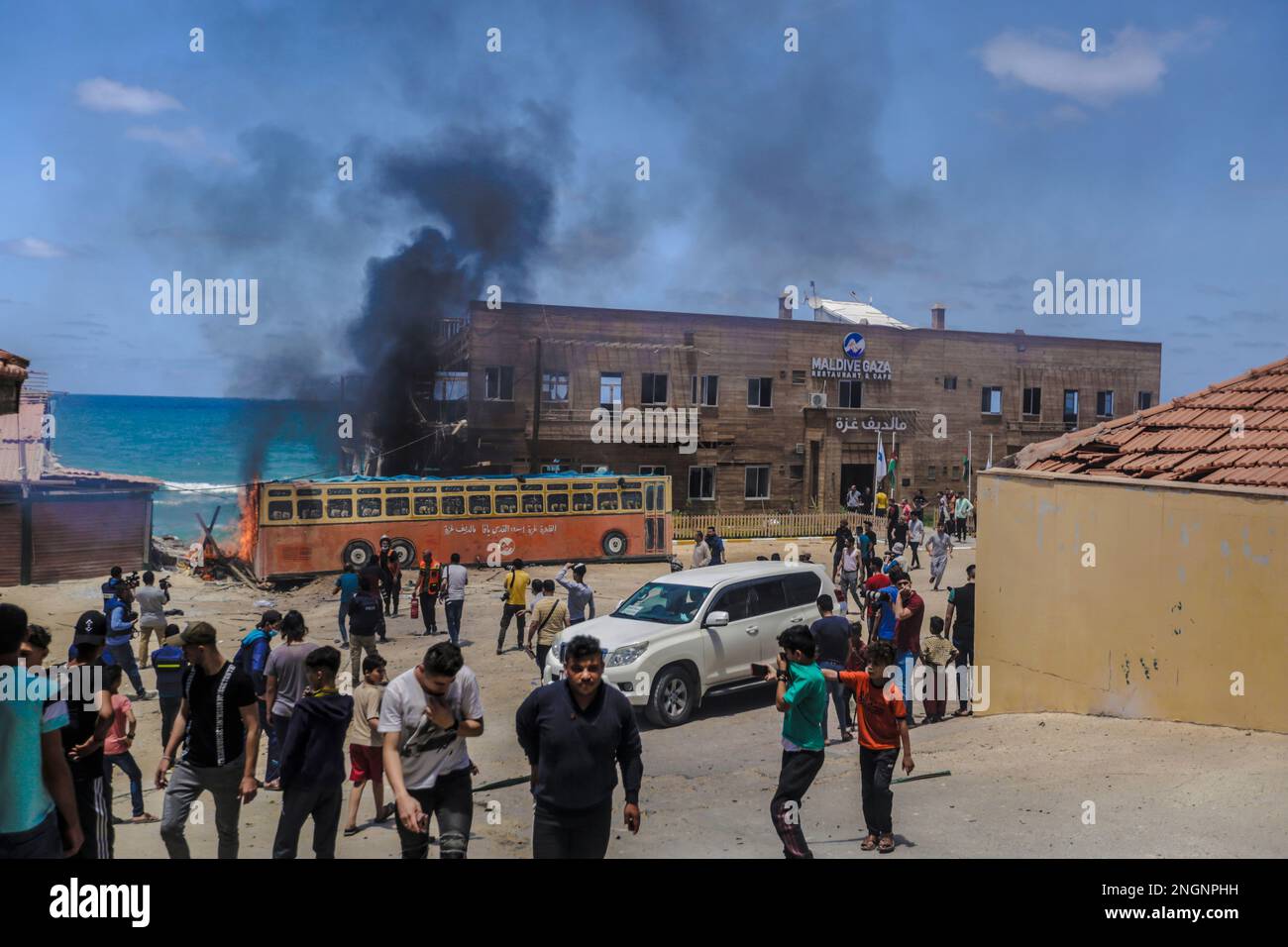Gaza, Palestine. Civil defense teams put out a fire after the Israeli ...