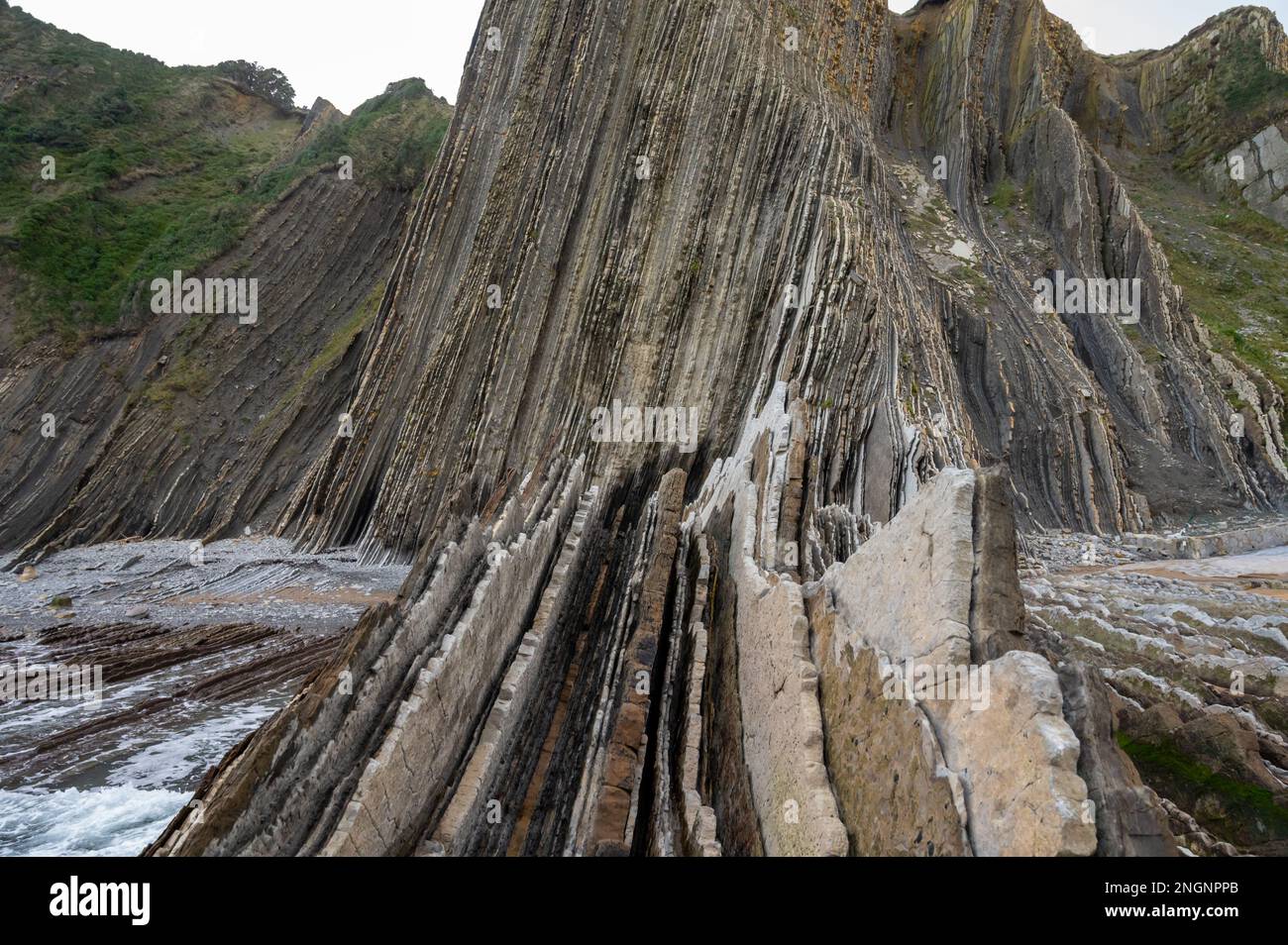 View on steeply-tilted layers of flysch geological formation on ...