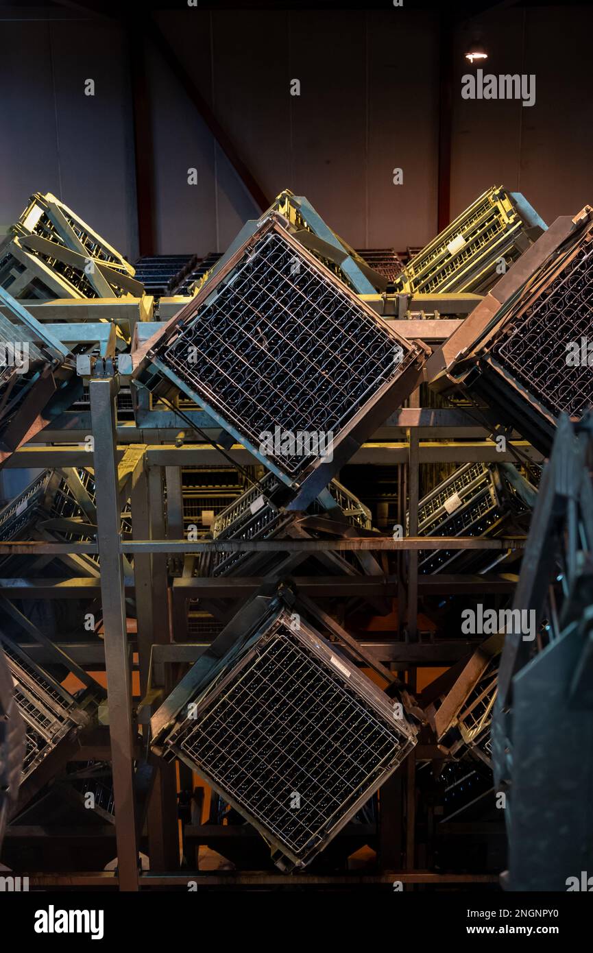 Production of cremant sparkling wine in Burgundy, France. Automatically ...