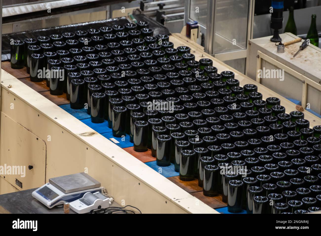Production of cremant sparkling wine in Burgundy, France. Automatically ...