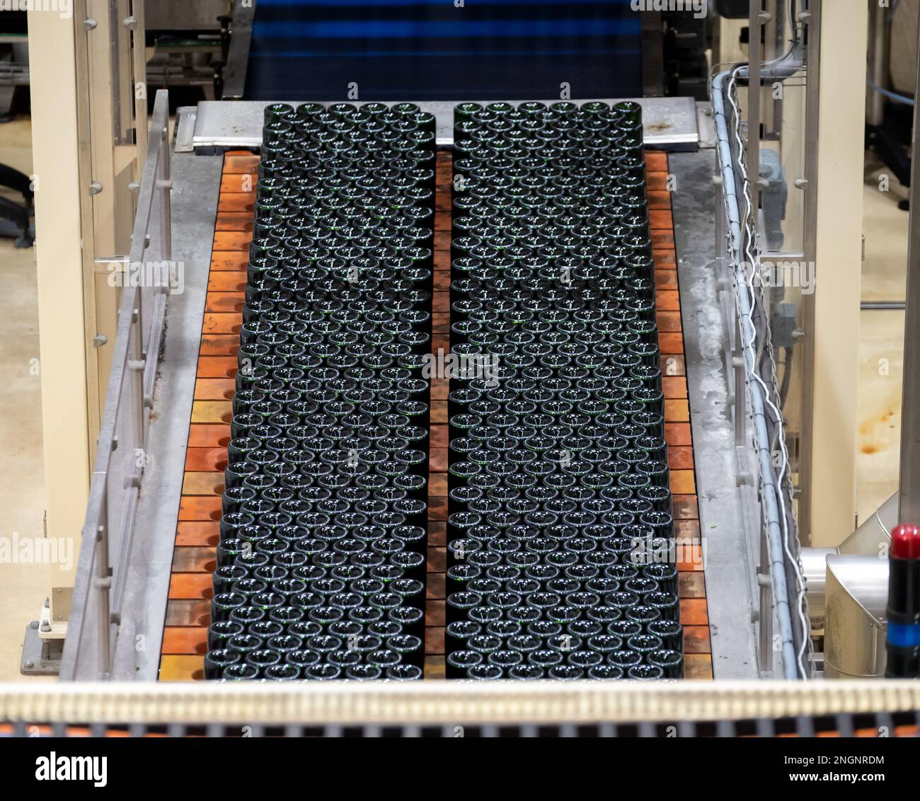 Production of cremant sparkling wine in Burgundy, France. Automatically ...