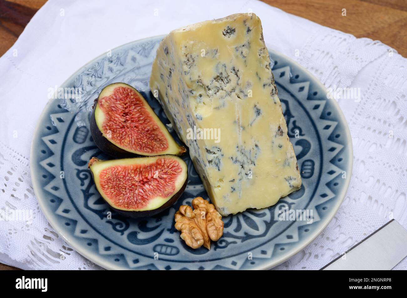 Cheese collection, English old stilton blue cheese close up served with ...