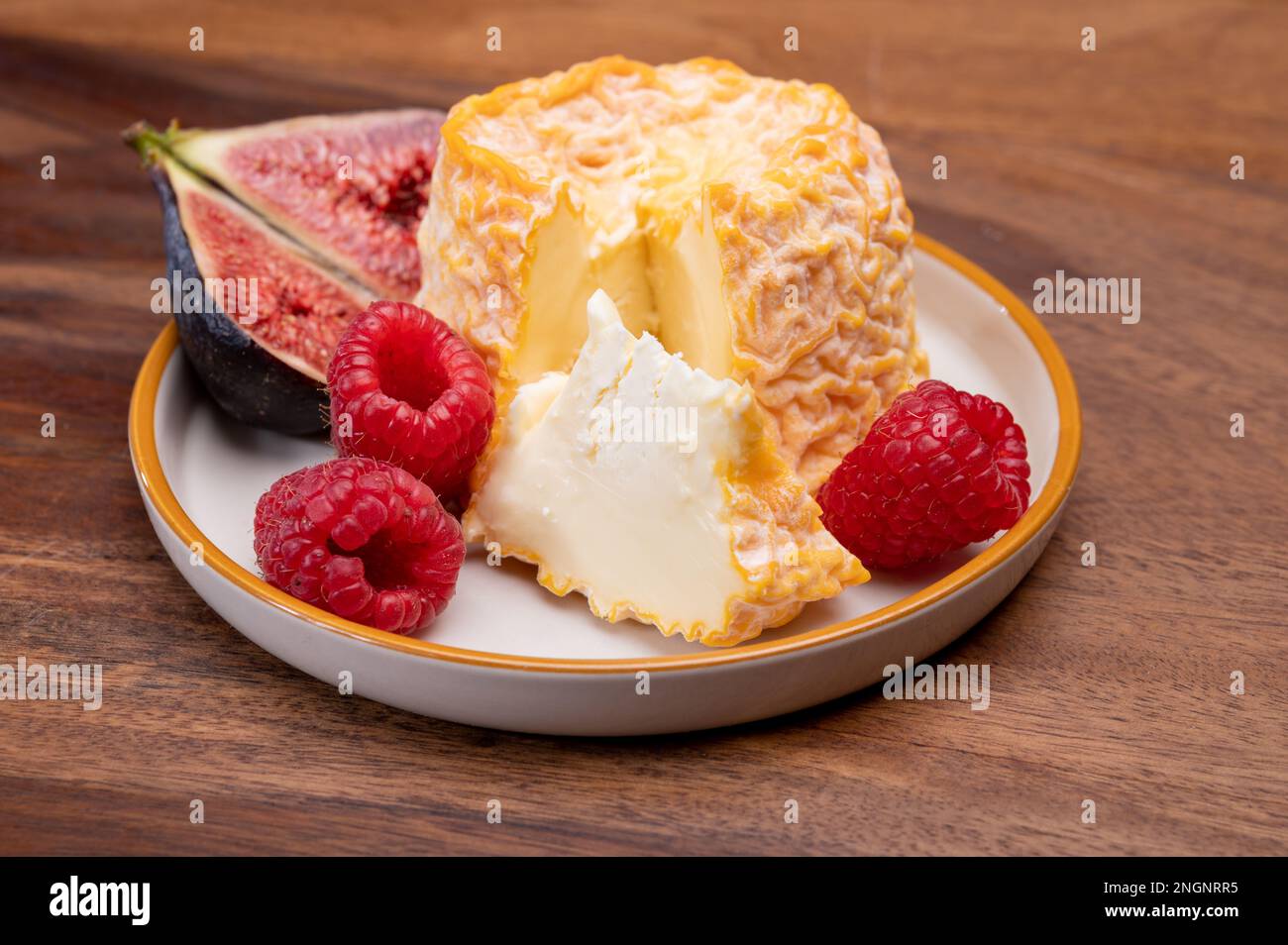 French Langres soft cows crumbly cheese with washed rind structure made ...