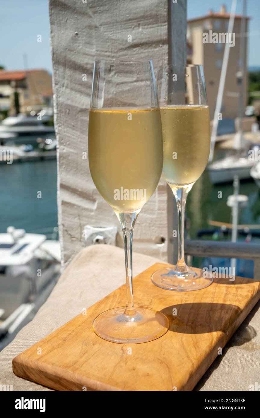 Summer party, drinking of French brut champagne sparkling wine in ...