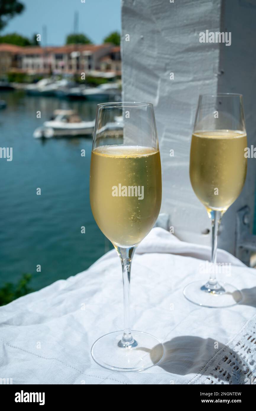 Summer party, drinking of French brut champagne sparkling wine in ...