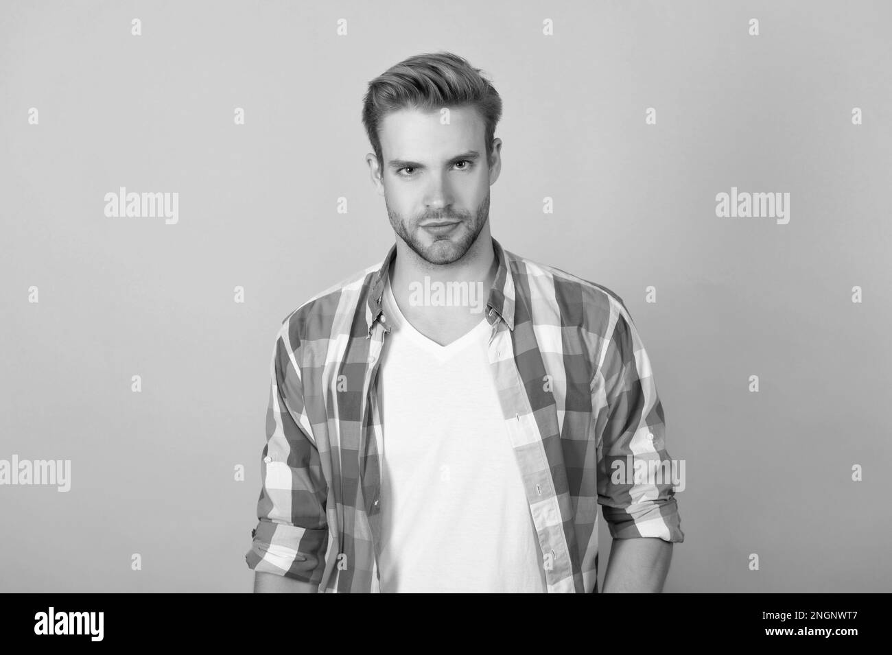 Seriously handsome. Regular guy portrait. Handsome guy yellow ...