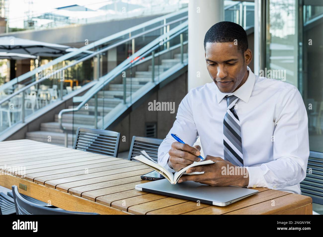 Handsome male african american business man CEO in a stylish corporate ...