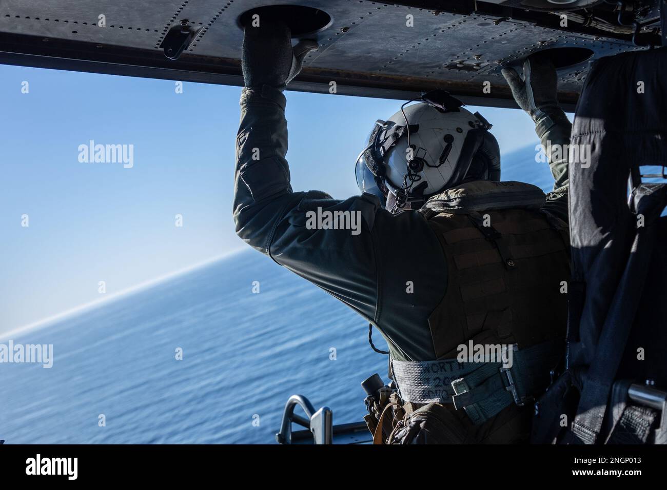 U.S. Marine Corps Gunnery Sgt. Joshua John Navarro, an aerial observer ...