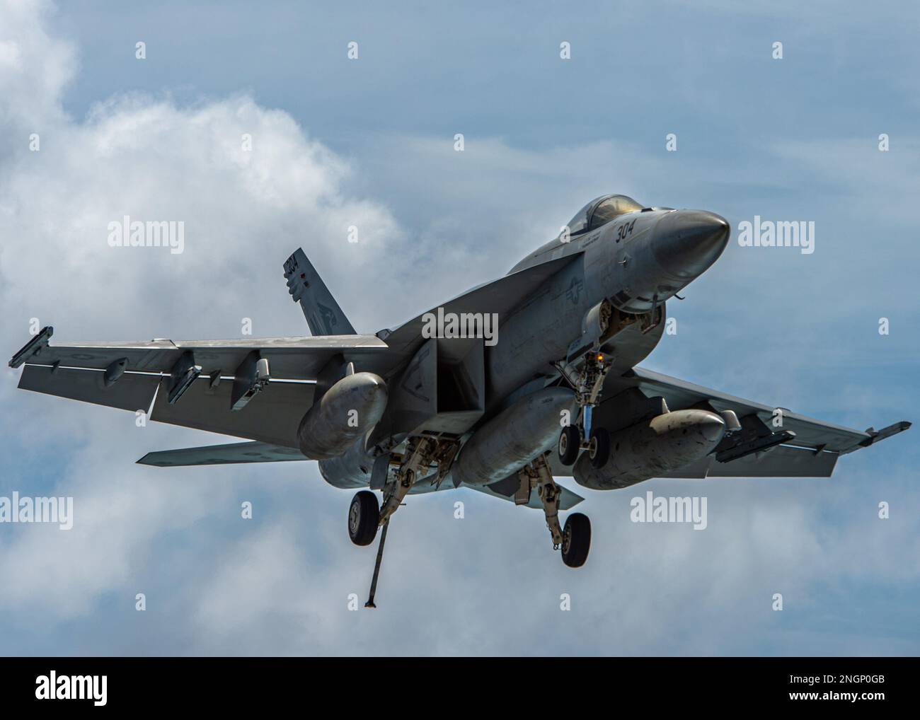 230217-N-MH015-2115 SOUTH CHINA SEA (Feb. 17, 2023) An F/A-18E Super Hornet from the “Kestrels ...