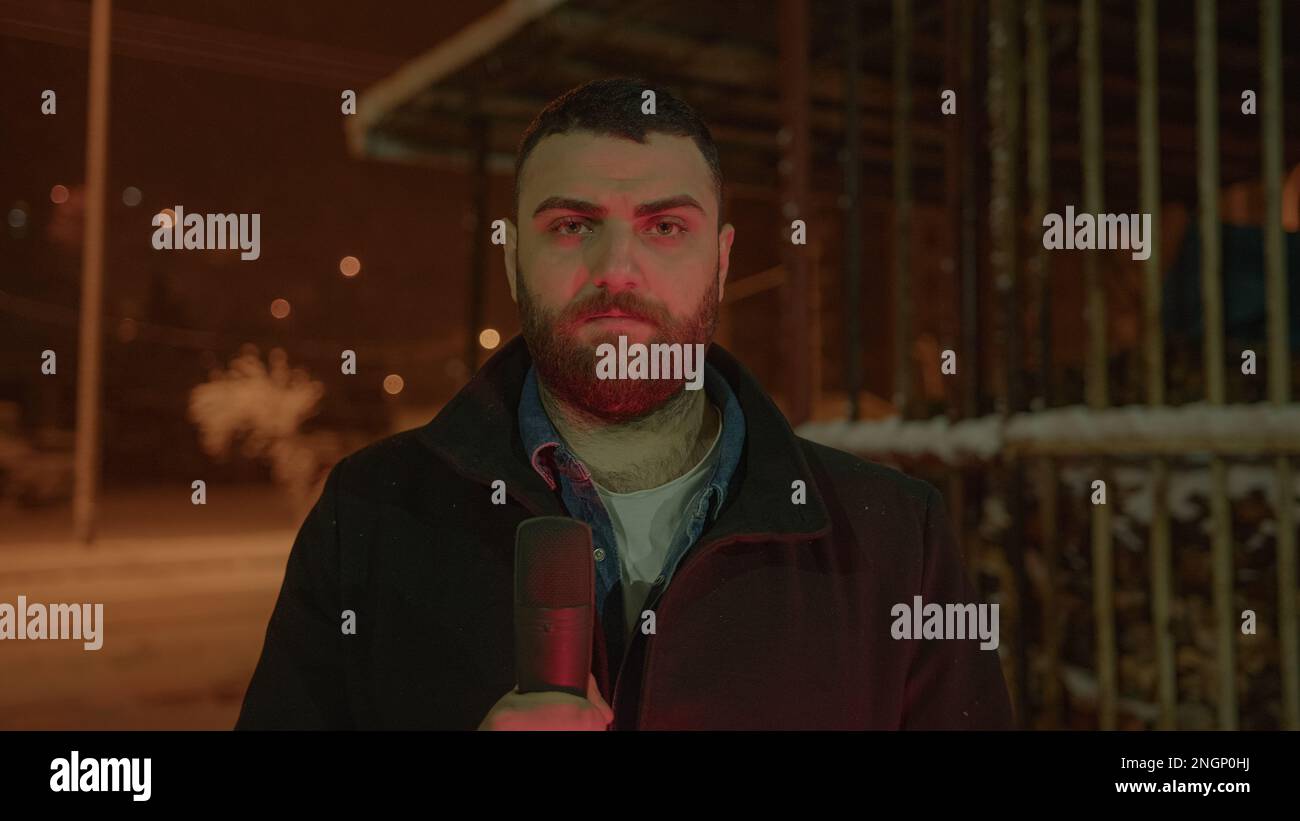 Broad-Shouldered Male Reporter Delivering Bad News in Snowy Background ...