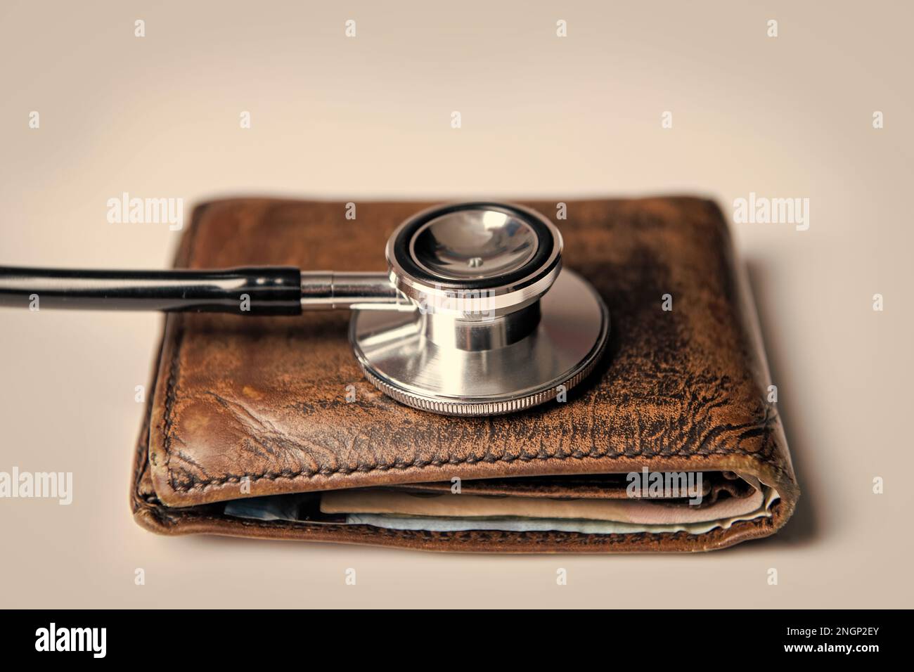 closeup of stethoscope and wallet as symbol of medical insurance. life ...