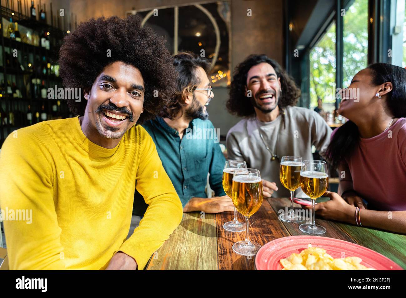 Drink after work happy colleagues hi-res stock photography and images ...