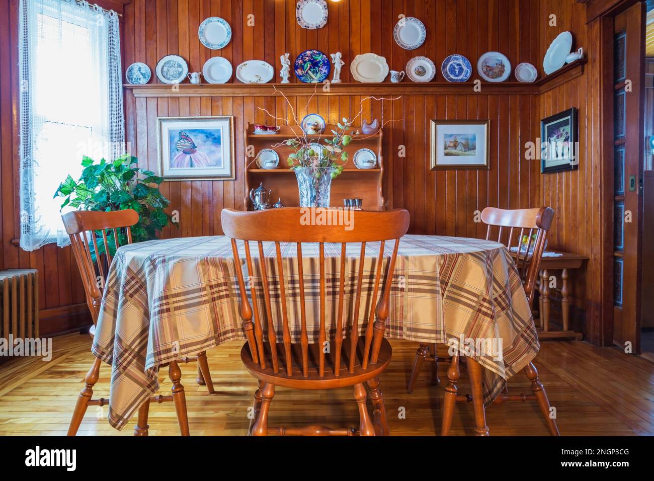 Antique oval shaped wooden table with high back chairs, buffet in ...