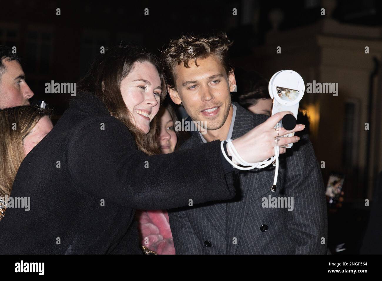 Austin Butler has a selfie with a fan as he arrives at the Charles ...