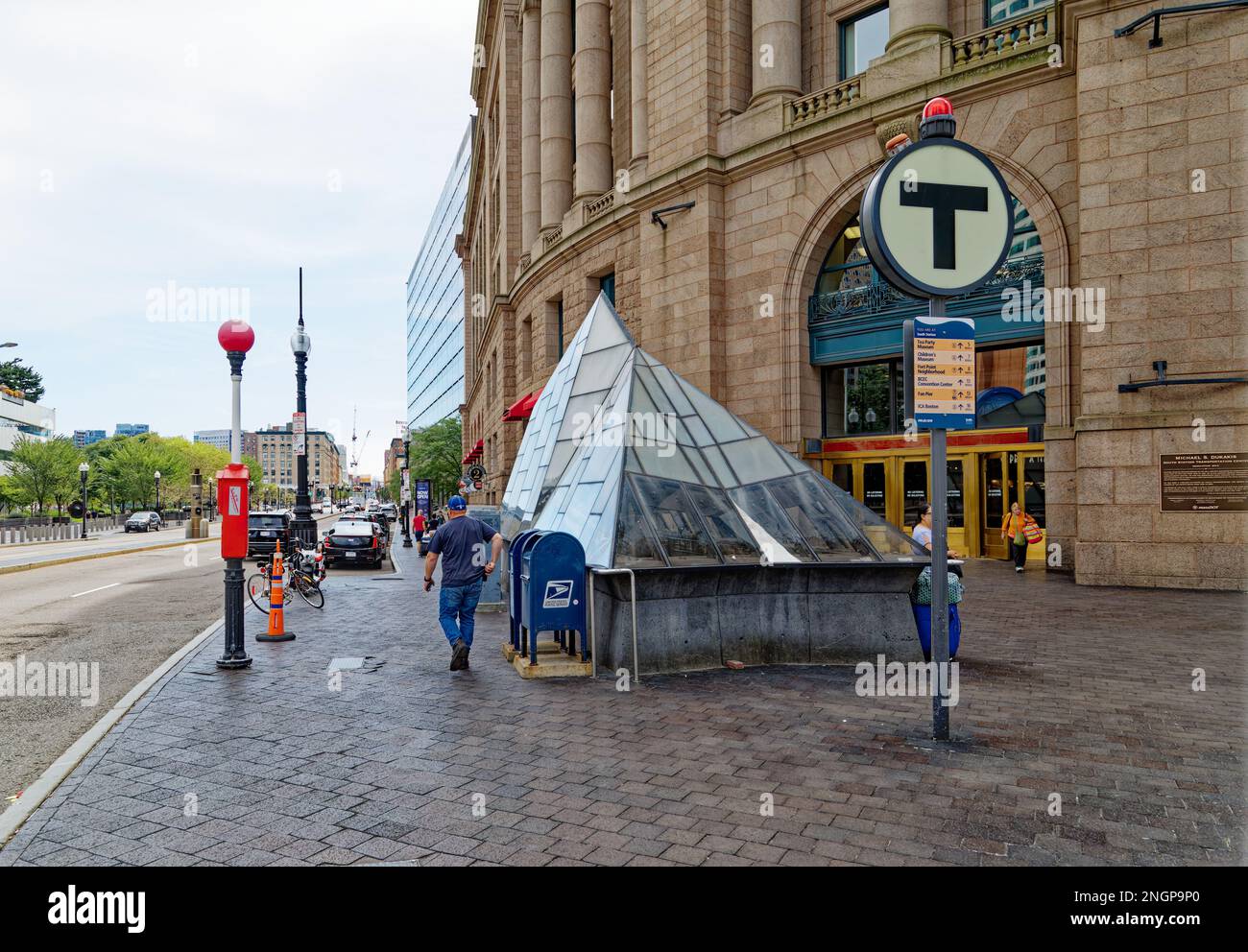 Modern concrete and glass subway entrances outside the neoclassical ...