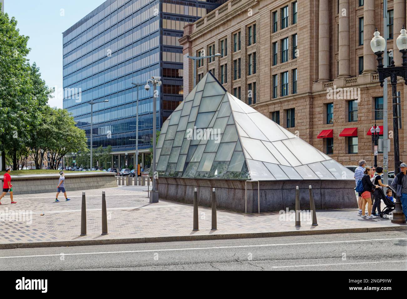 Modern concrete and glass subway entrances outside the neoclassical ...