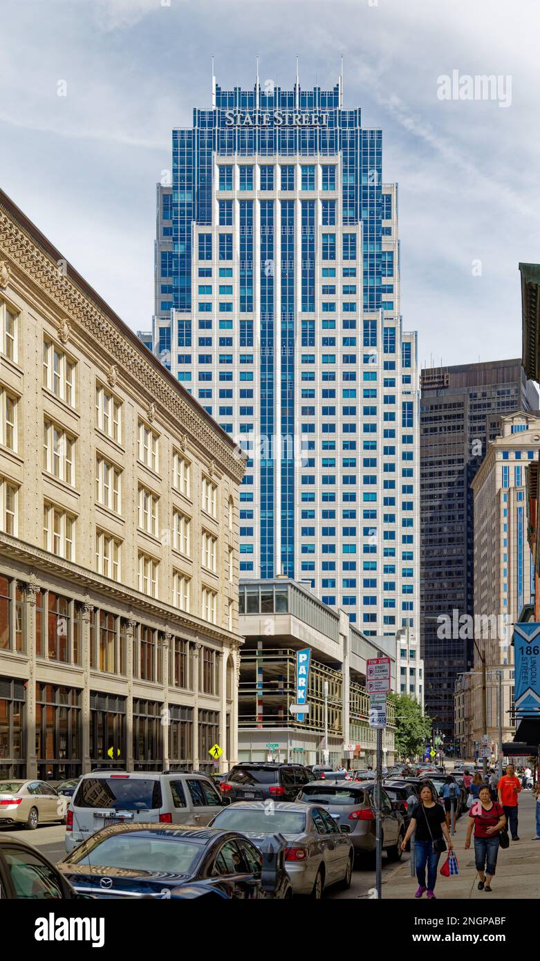 State Street Financial Center is a grey and blue tower capped in blue ...