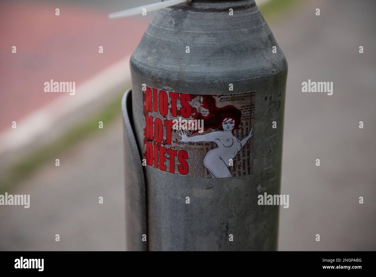 Sticker on a lamp post hi-res stock photography and images - Alamy