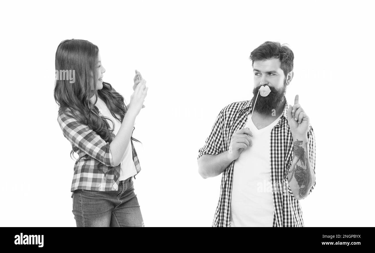 Grab a prop. Father and daughter enjoy fun photobooth. Image sharing ...