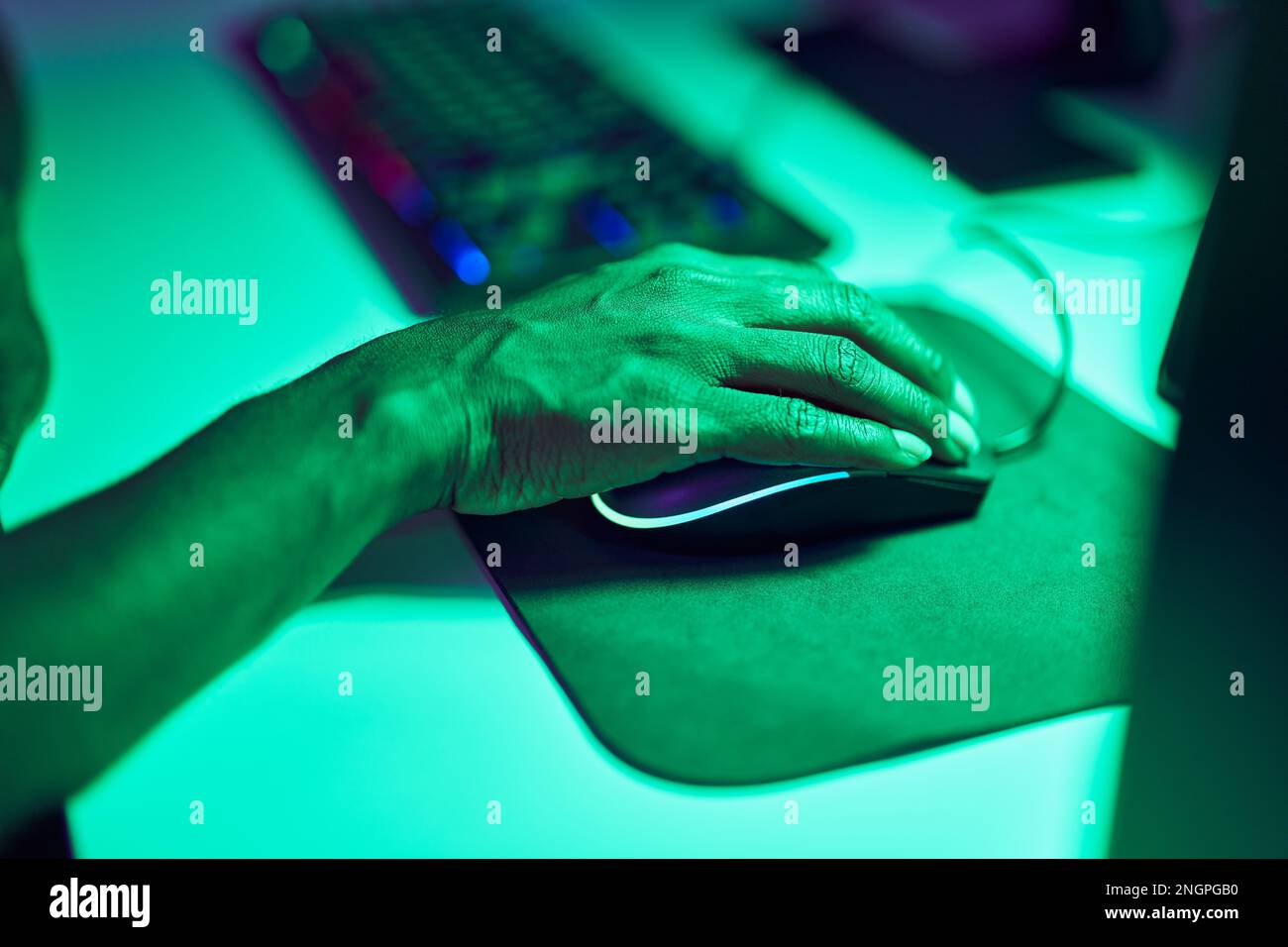 African american woman using mouse computer at gaming room Stock Photo ...