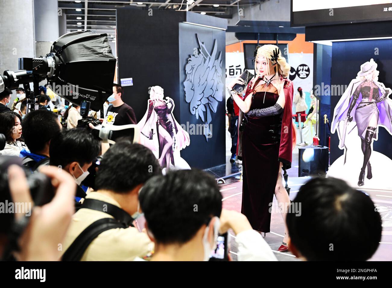 GUANGZHOU, CHINA - FEBRUARY 18, 2023 - Cosplayers and visitors take ...