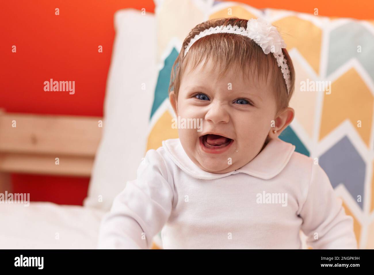 Adorable blonde baby smiling hi-res stock photography and images - Alamy