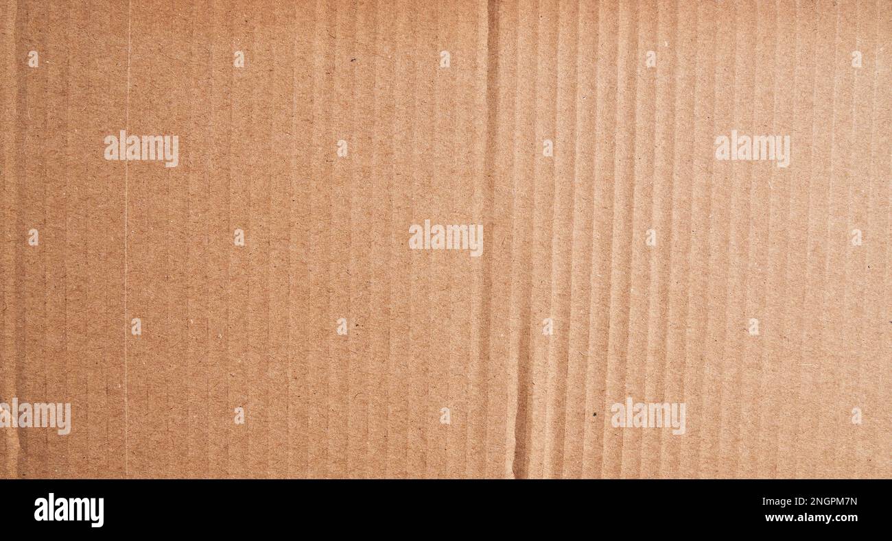 Brown cardboard carton material texture background Stock Photo - Alamy
