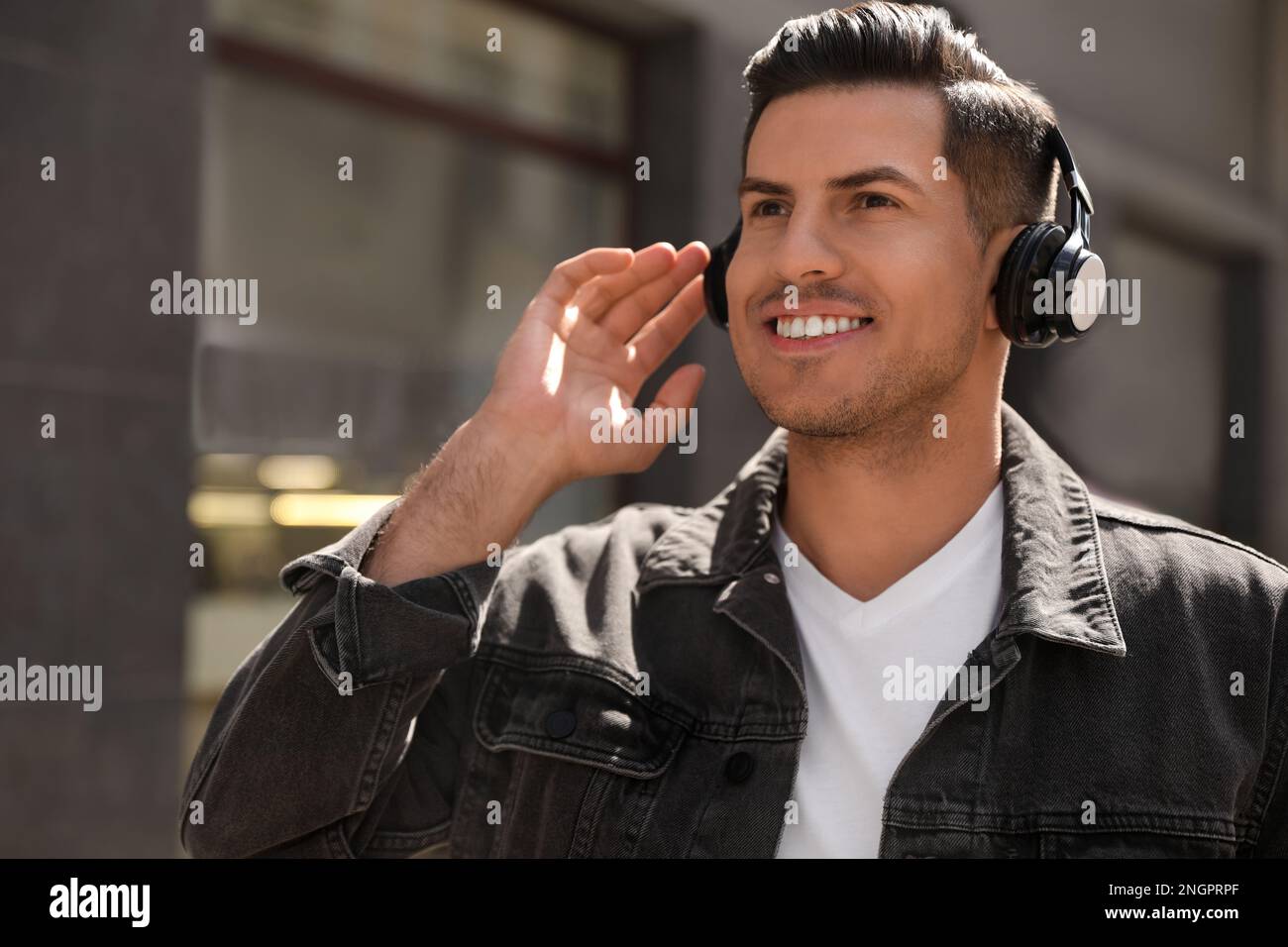 Candid man listening song hi-res stock photography and images - Alamy