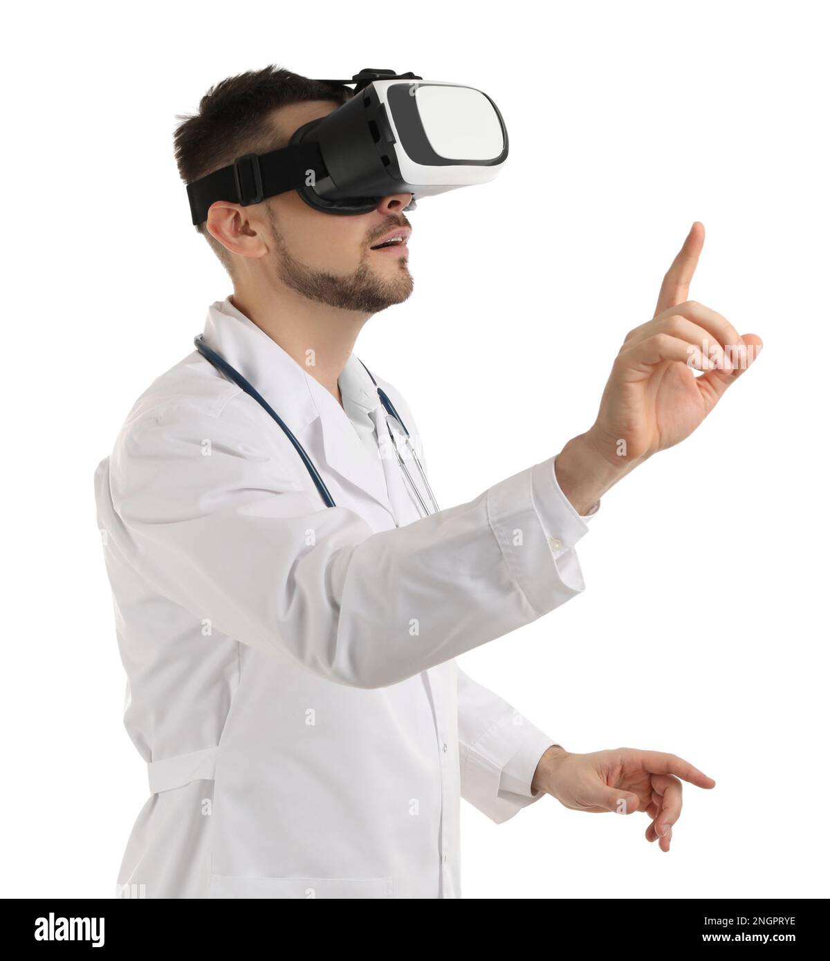 Doctor using virtual reality headset on white background Stock Photo ...