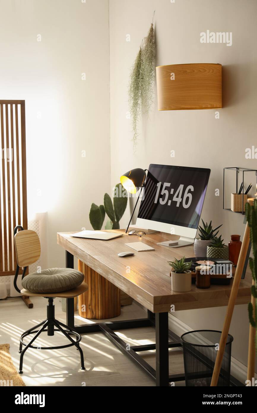 Room interior with comfortable workplace. Modern computer on wooden ...
