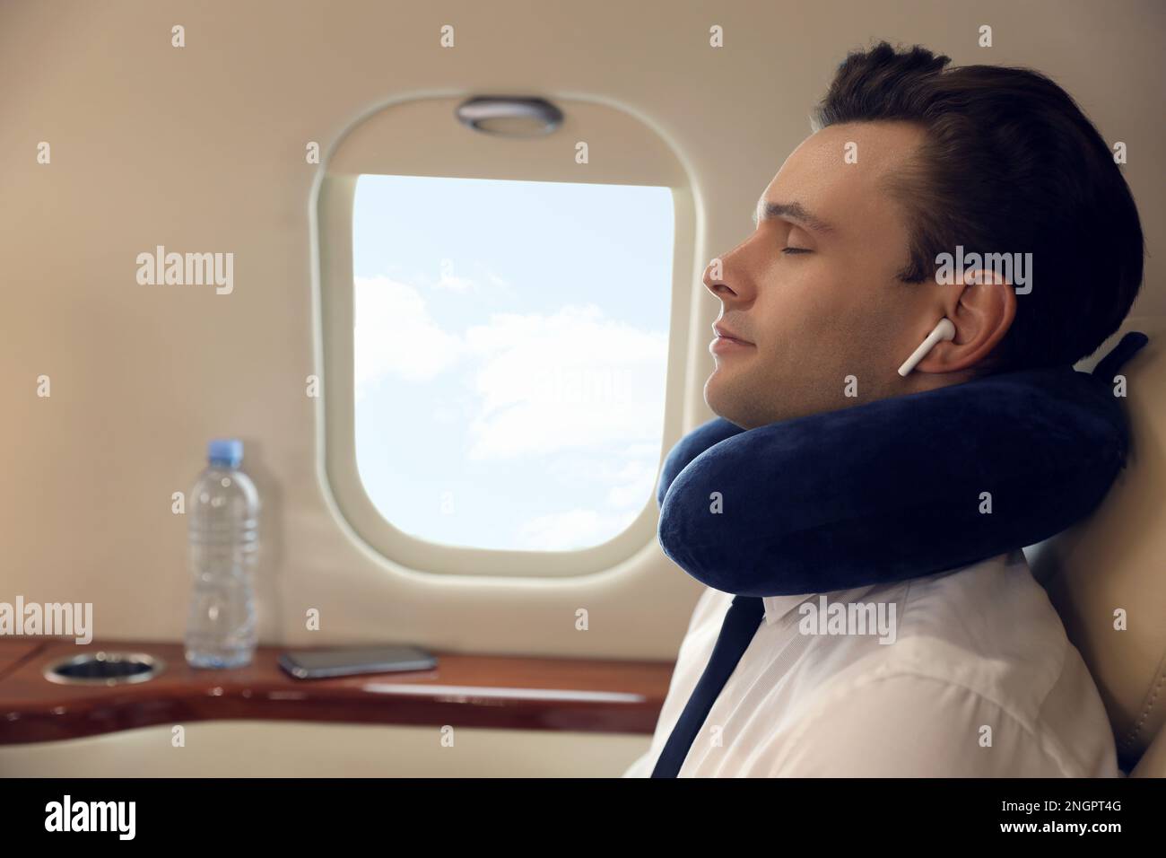 Businessman sleeping airport hi-res stock photography and images - Alamy