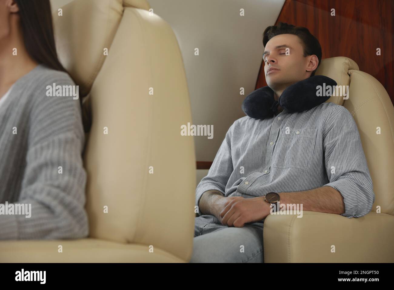 Man sleeping in airplane hi-res stock photography and images - Alamy