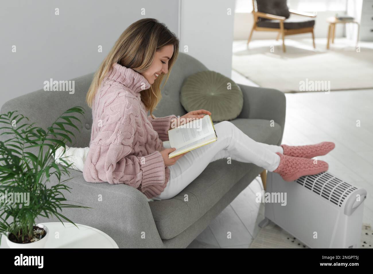 Caucasian girl reading book feet hi-res stock photography and images ...