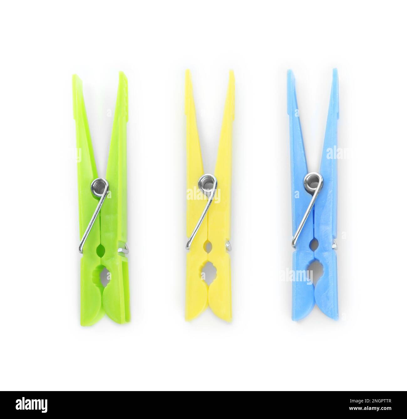 Colorful plastic clothespins on white background, top view Stock Photo ...