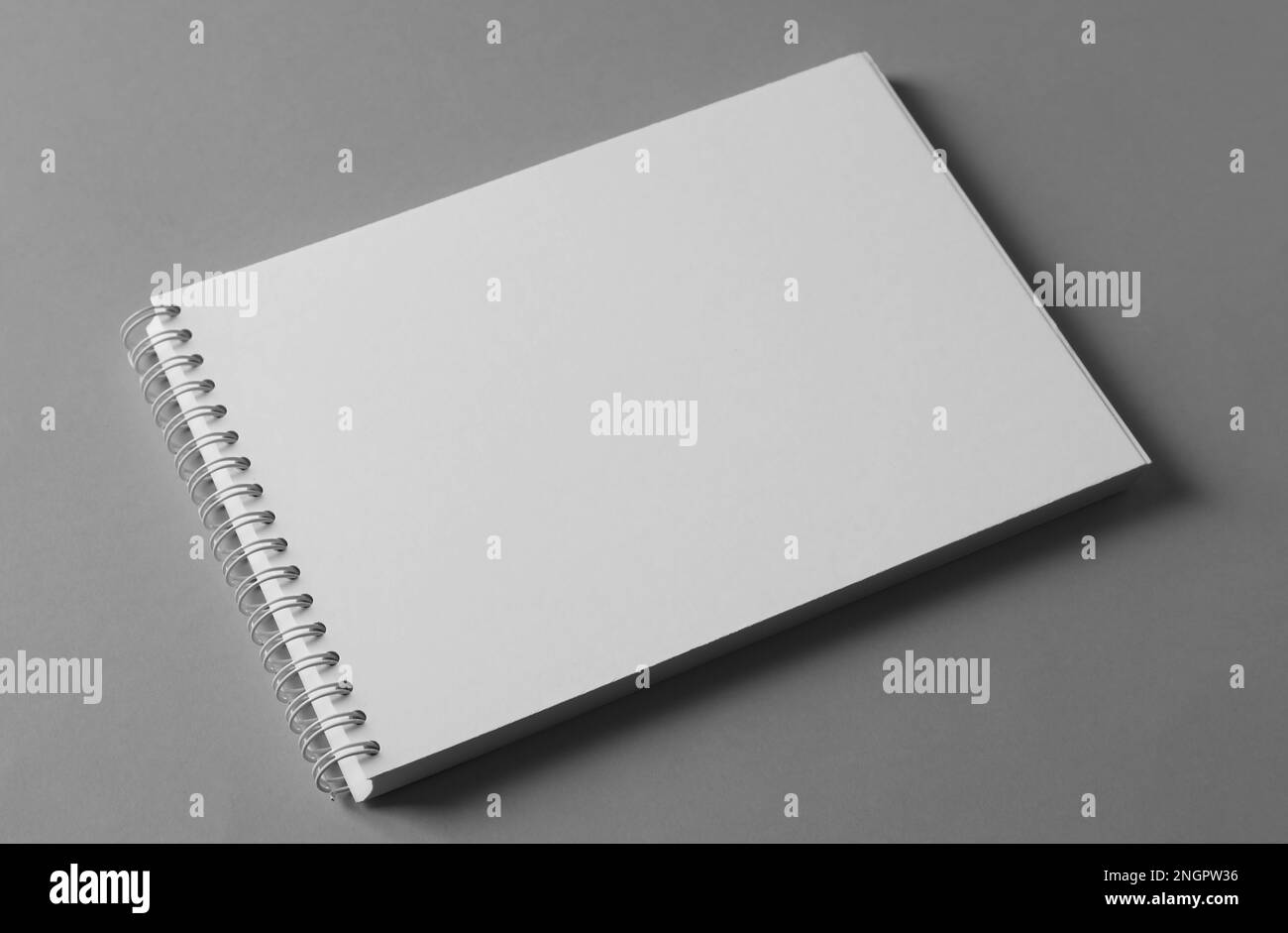 Blank notebook on light grey background. Mockup for design Stock Photo ...