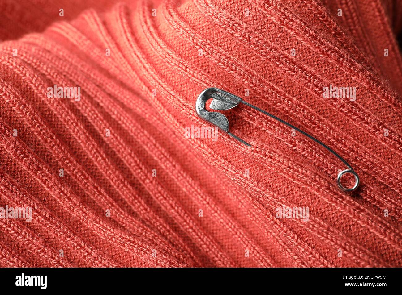 Safety pin fabric hi-res stock photography and images - Alamy