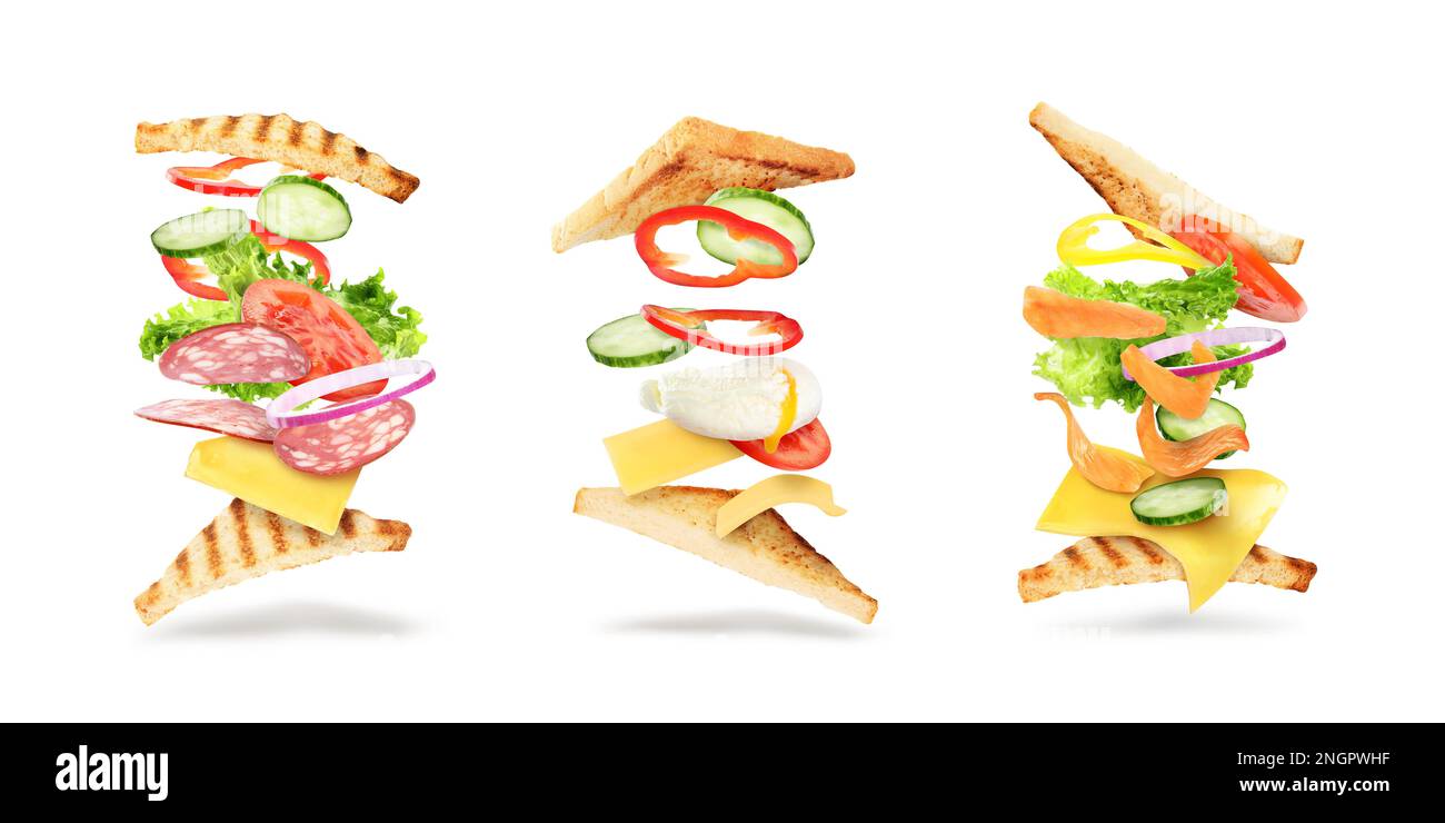 Delicious sandwiches with flying ingredients on white background ...