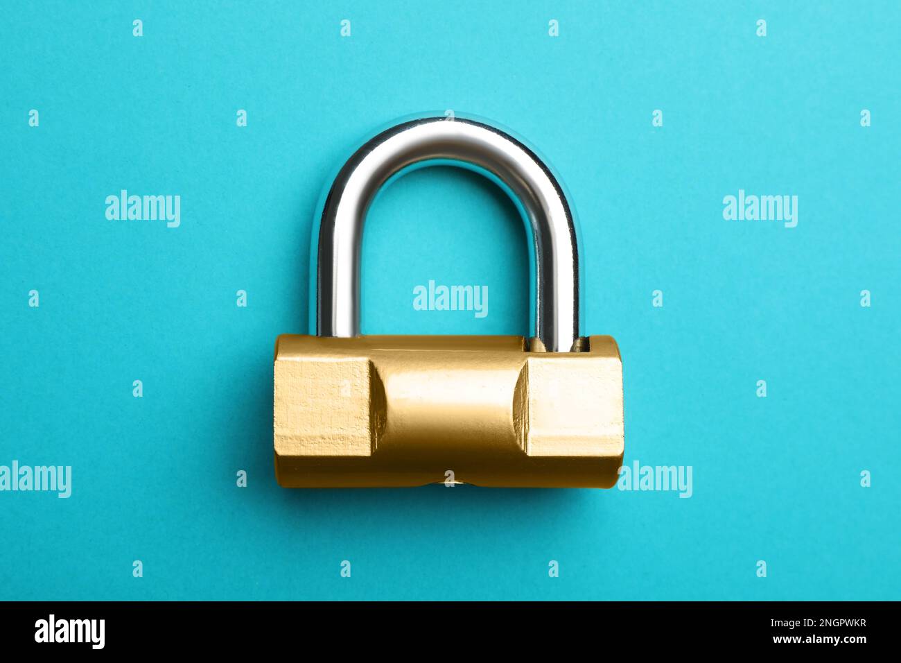 Modern padlock on light blue background, top view Stock Photo - Alamy