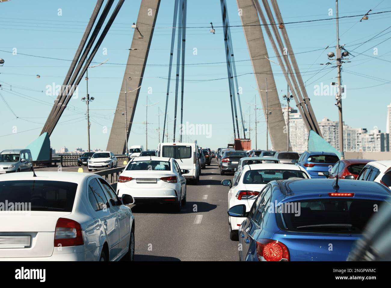 Cars in traffic jam on city street Stock Photo - Alamy