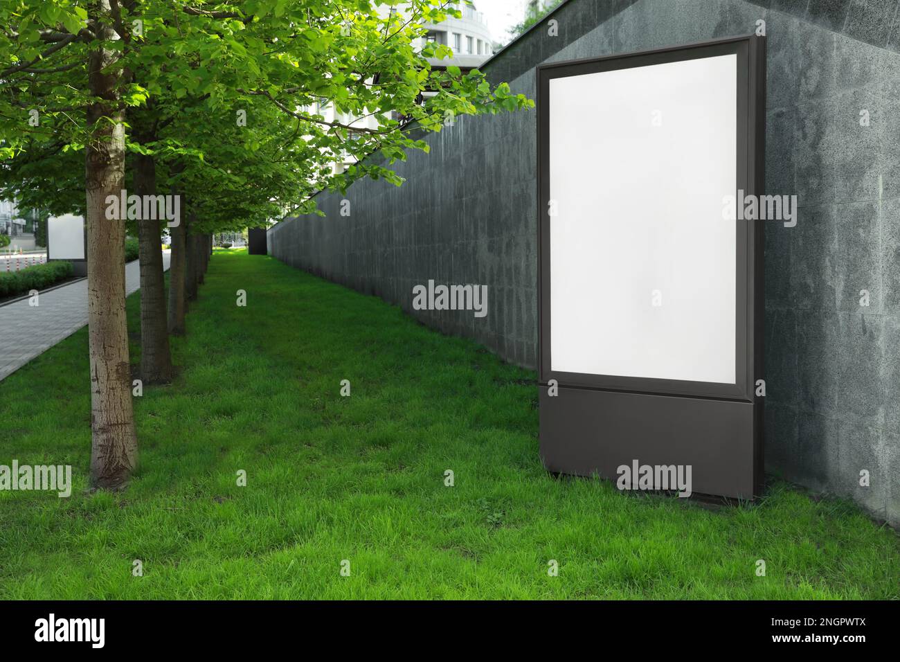 Blank advertising board on city street. Mockup for design Stock Photo ...