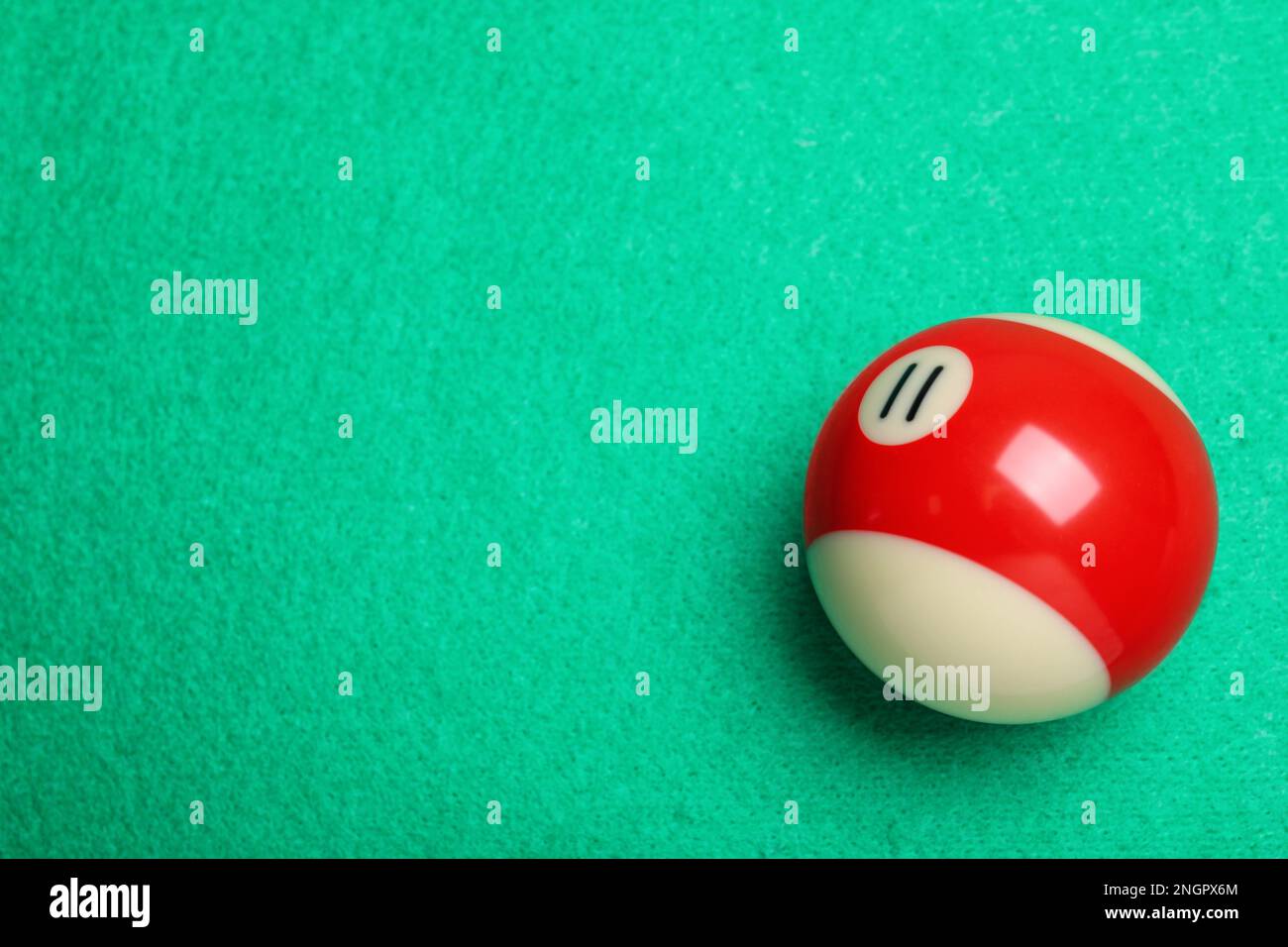 Billiard ball with number 11 on green table, top view. Space for text ...