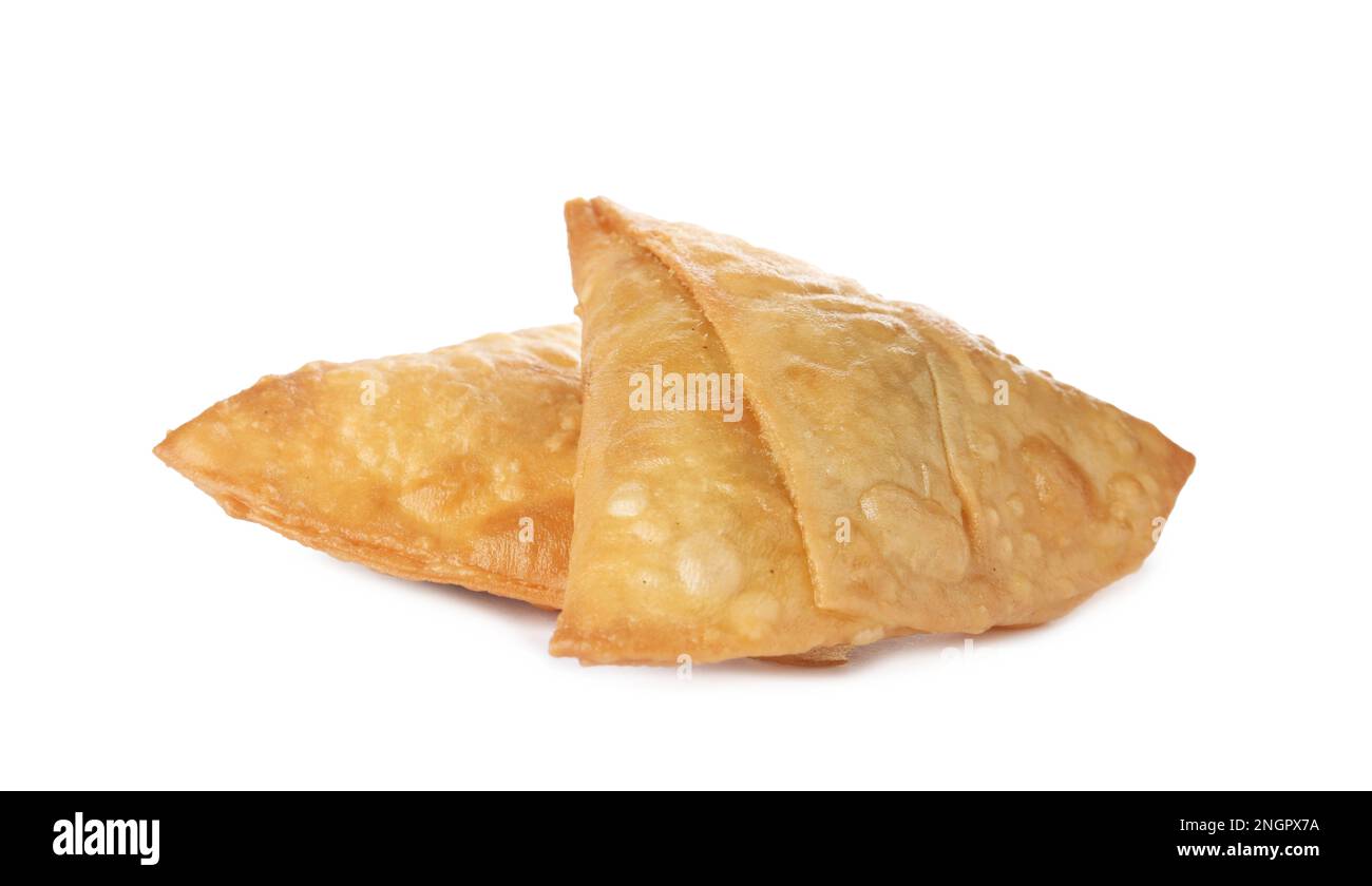 Fresh delicious crispy samosas on white background Stock Photo - Alamy