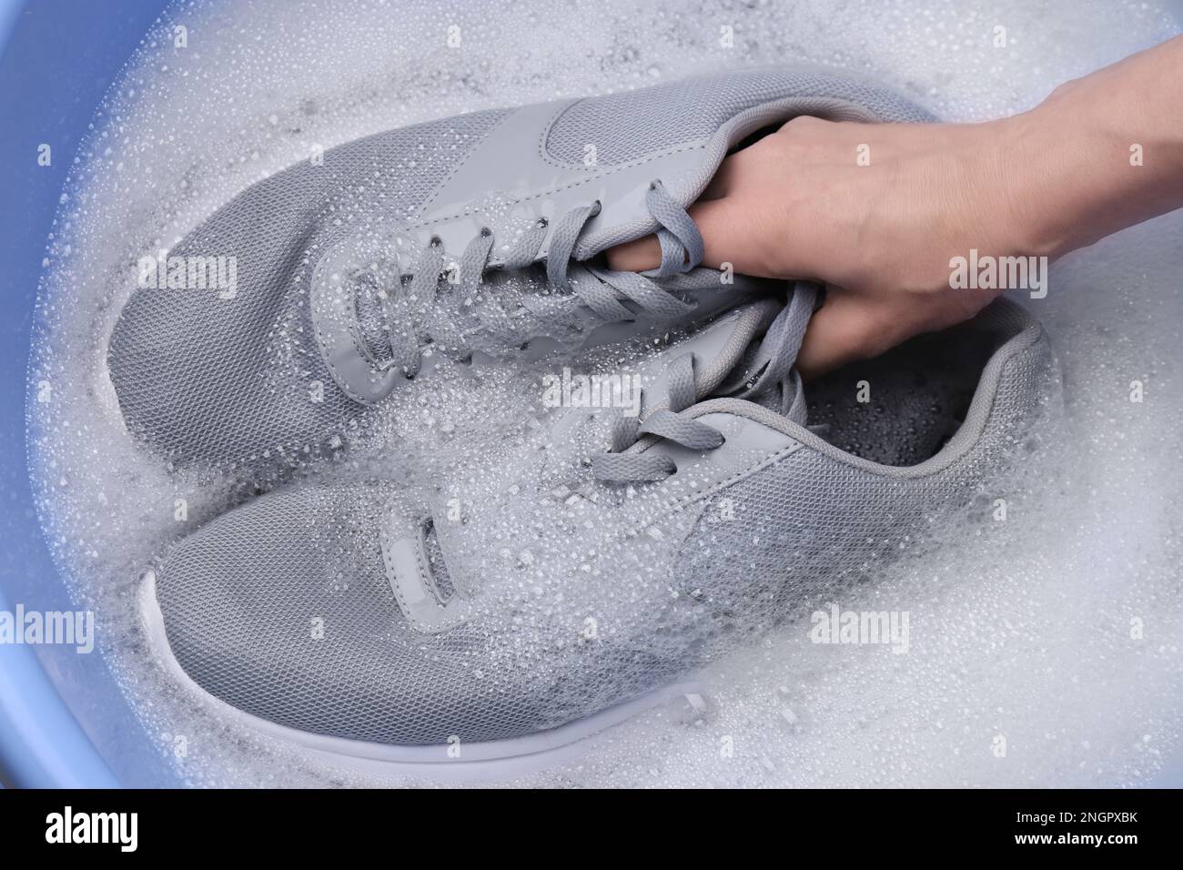 Shoes in wash basin hi-res stock photography and images - Alamy