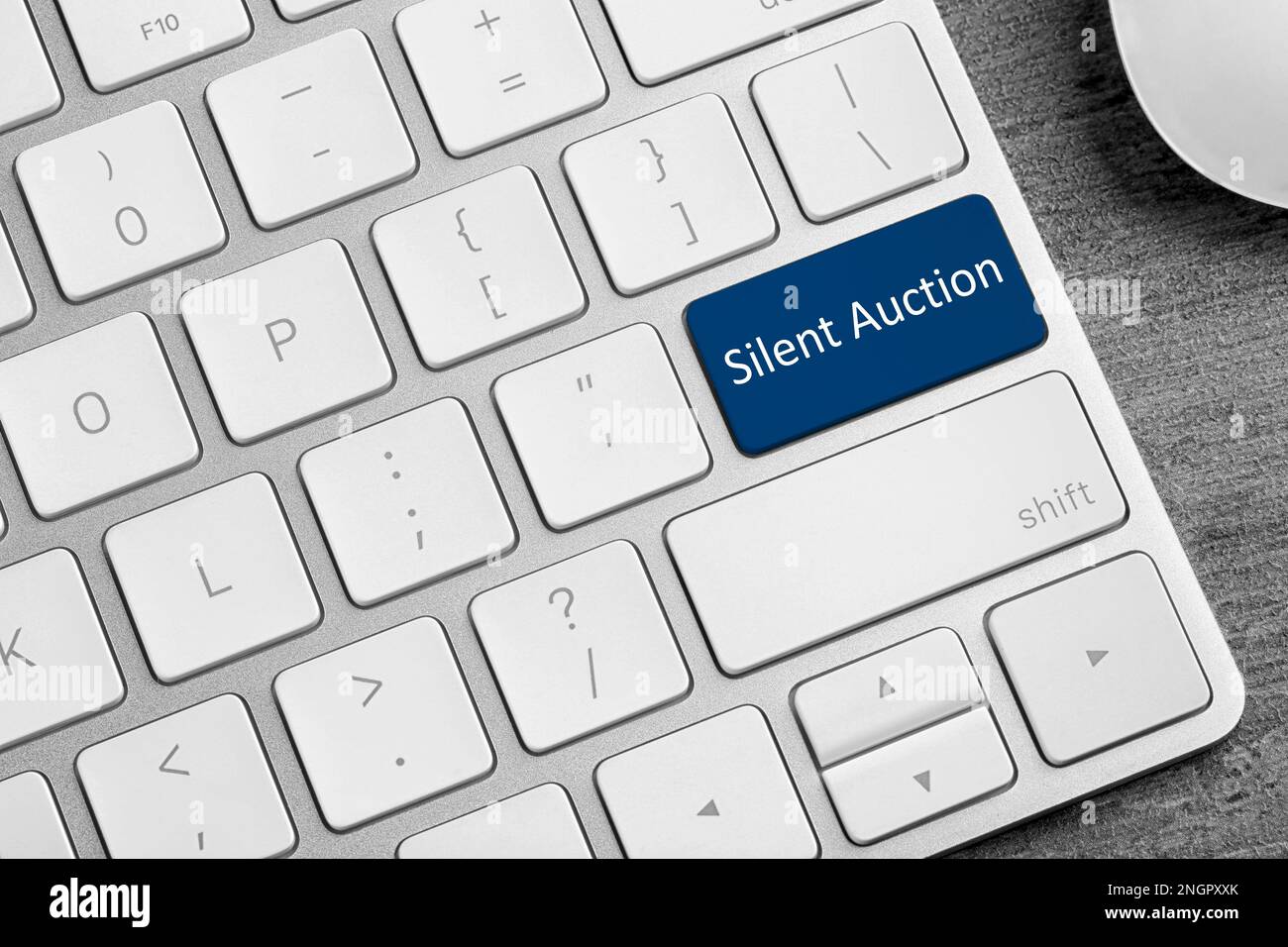 Modern computer keyboard with text Silent Auction on button, closeup ...