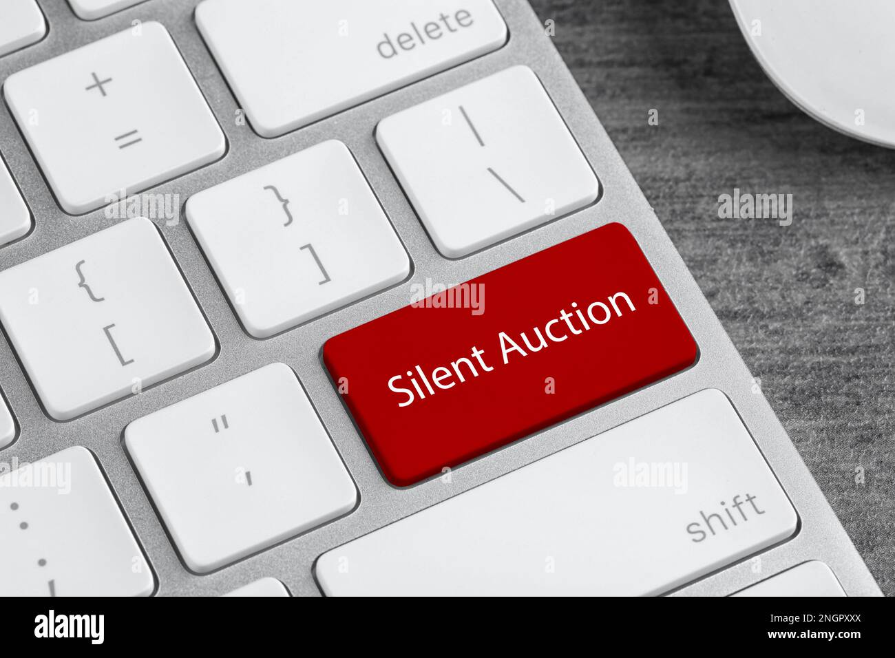 Modern computer keyboard with text Silent Auction on button, closeup ...