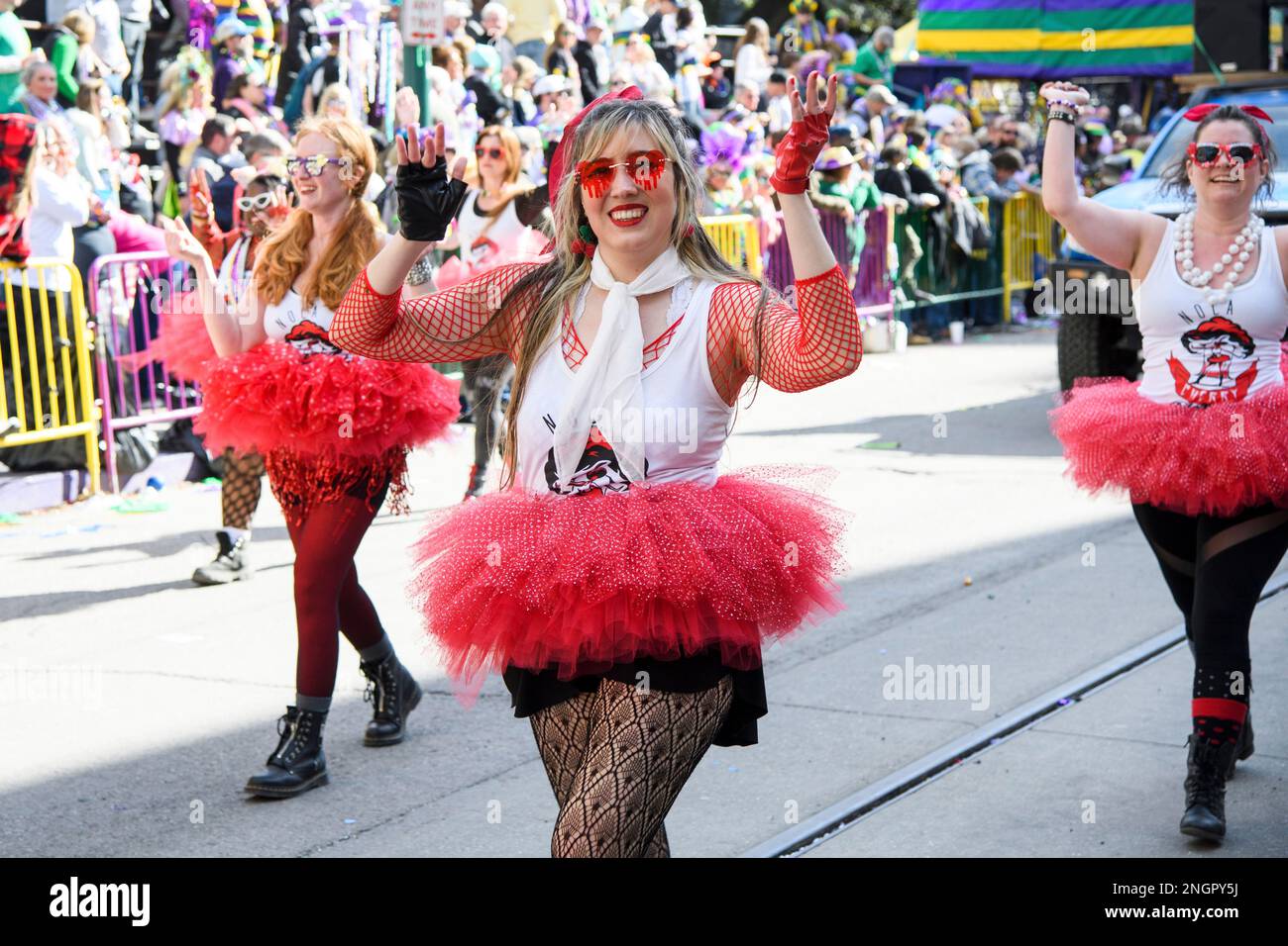 Parade goers are seen at the Krewe Of Iris parade on Saturday, Feb 18 ...