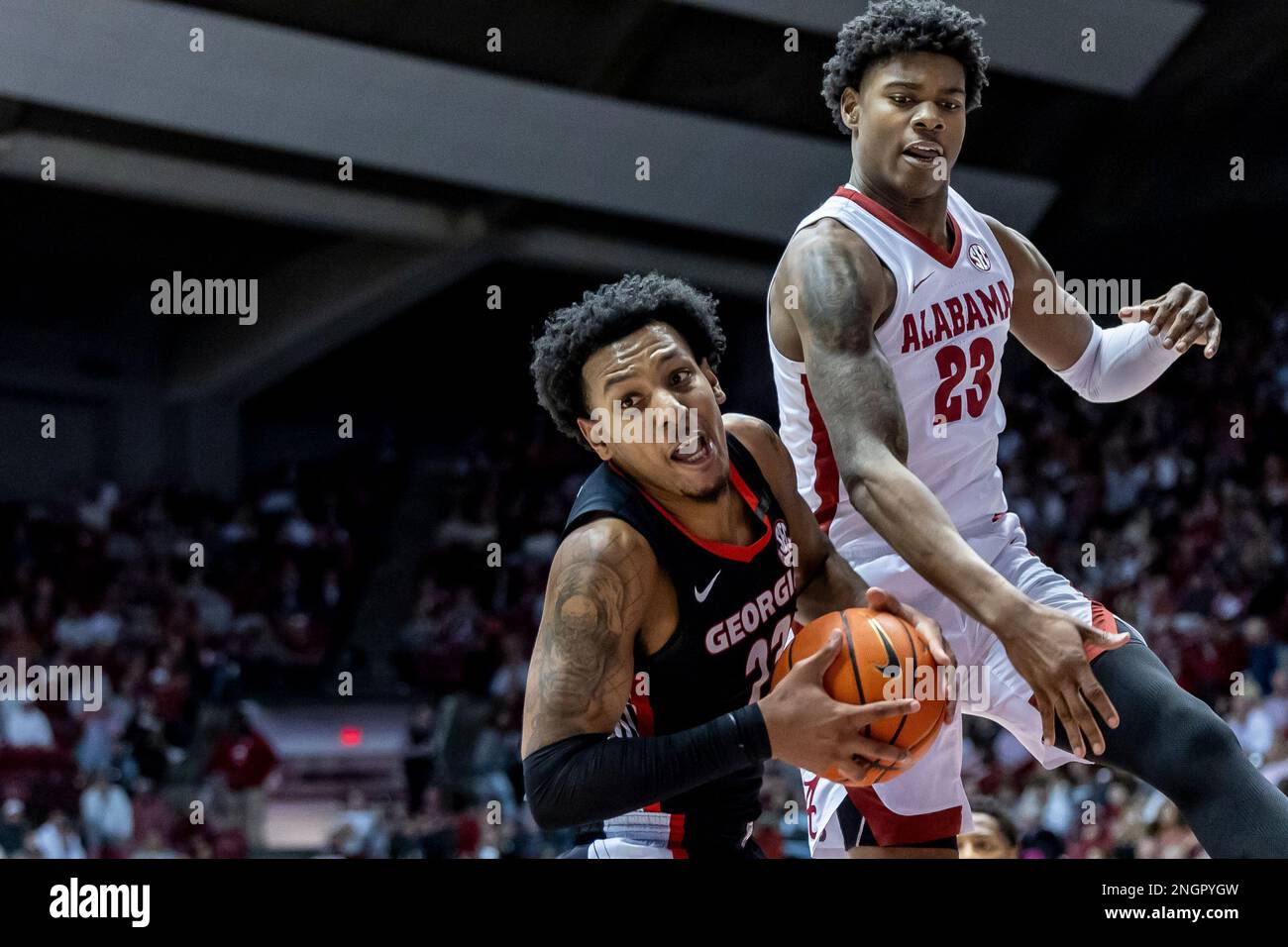 Georgia center Braelen Bridges (23) grabs the ball from Alabama forward ...