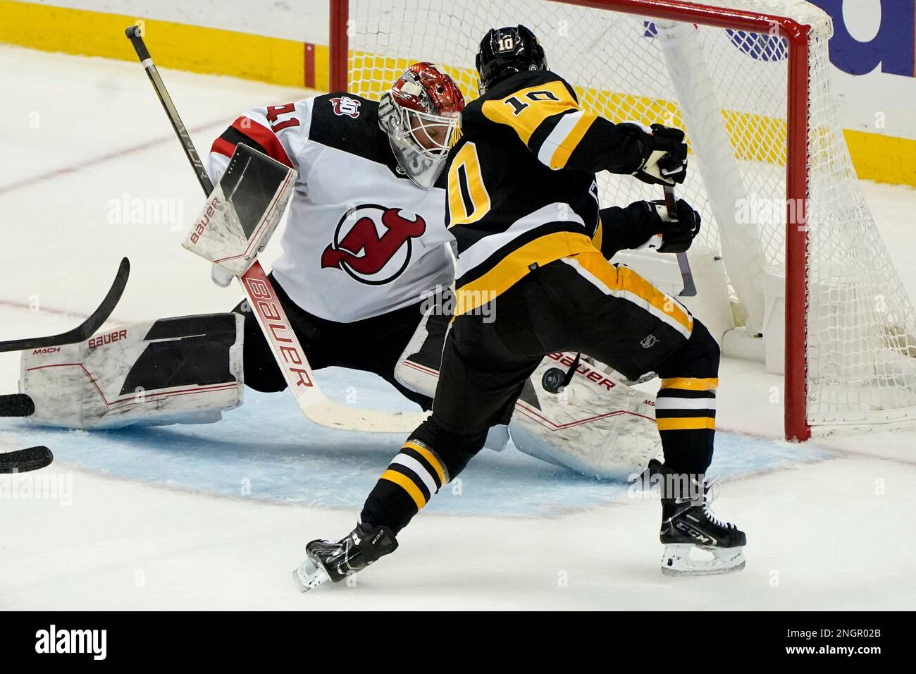New Jersey goaltender Vitek Vanecek (41) makes a save on Pittsburgh ...